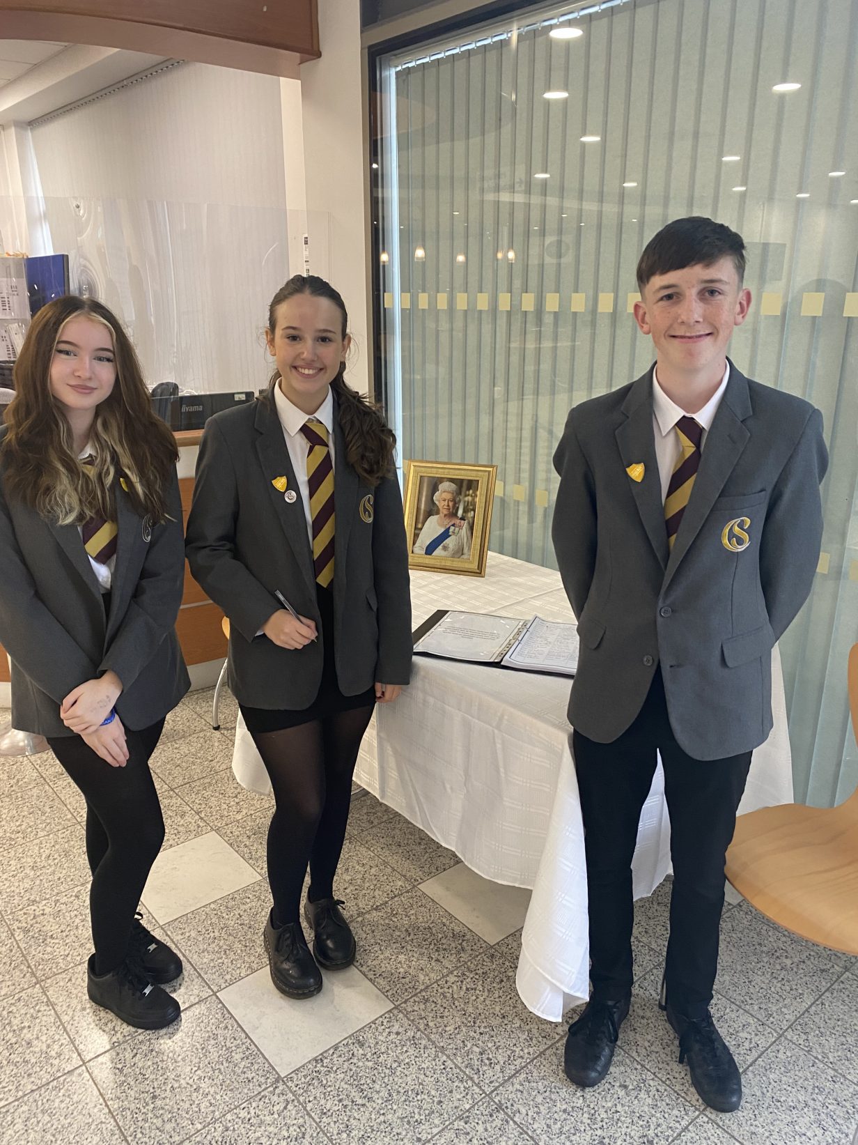 HEAD TEACHER SIGNS CONDOLENCES BOOK | Cefn Saeson Comprehensive School
